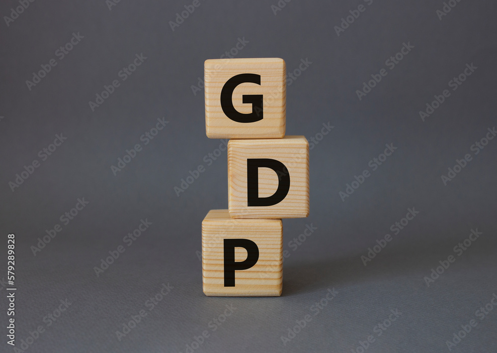 GDP - Gross domestic product symbol. Concept word GDP on wooden cubes ...