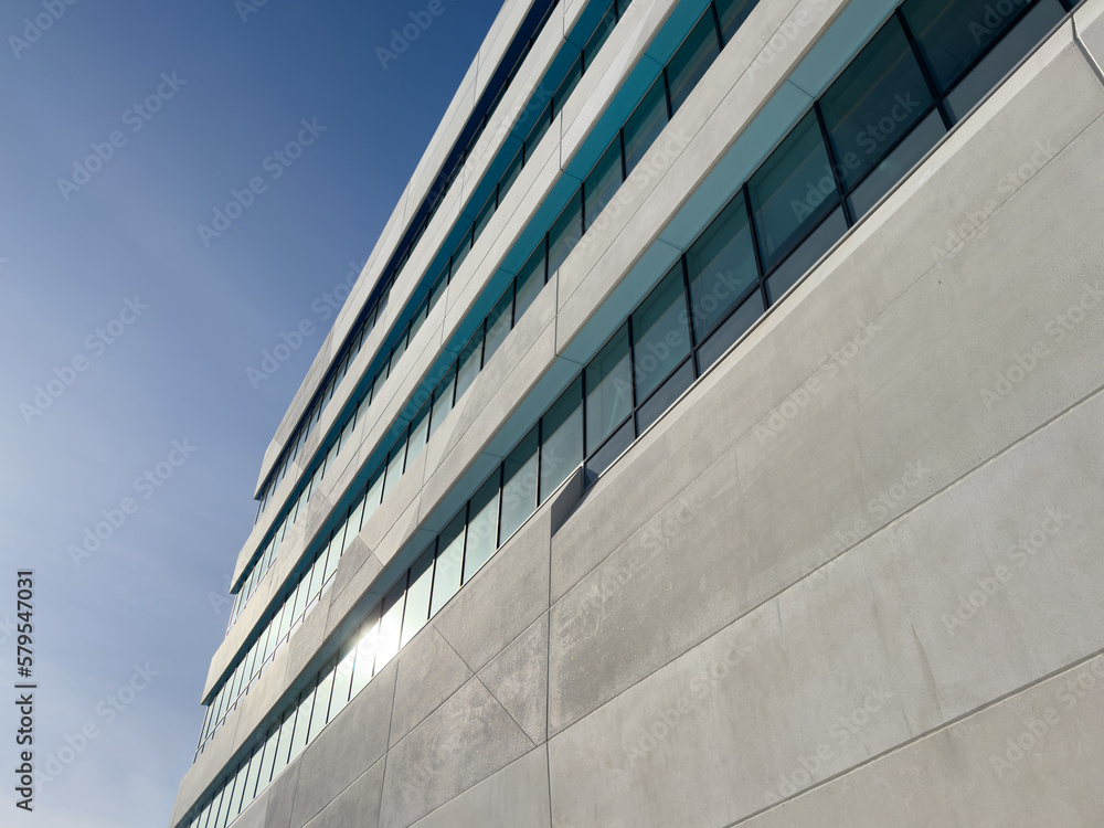 The exterior wall of a contemporary commercial style building with ...