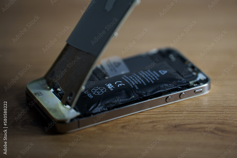 Iphone with exploded Lithium-ion battery. Li-ion swollen battery Stock ...