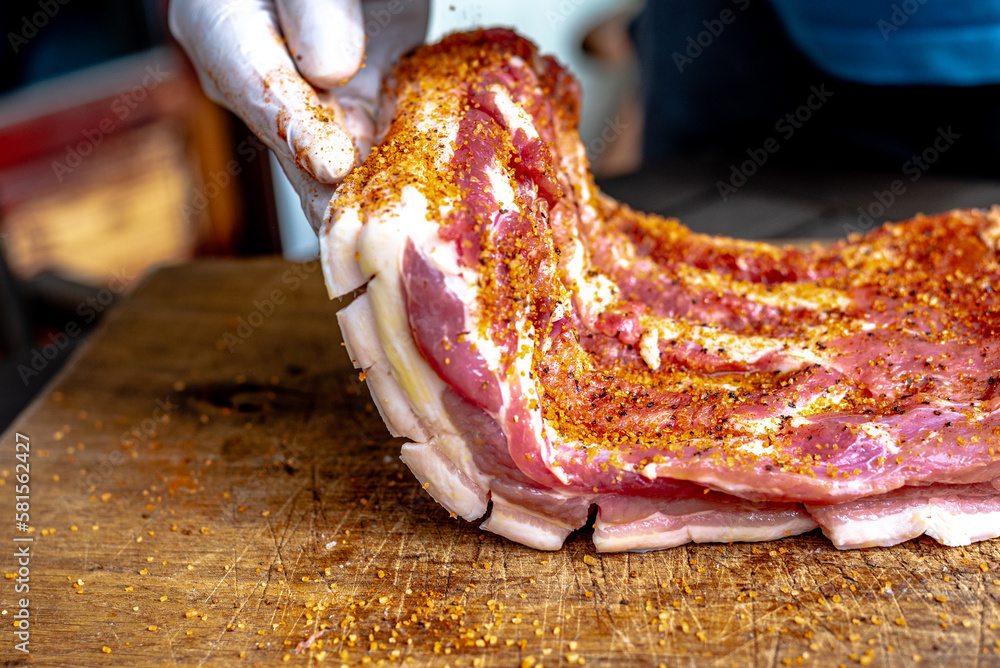 Foto Meat preparation for BBQ.Pork belly is a boneless and fatty cut of ...