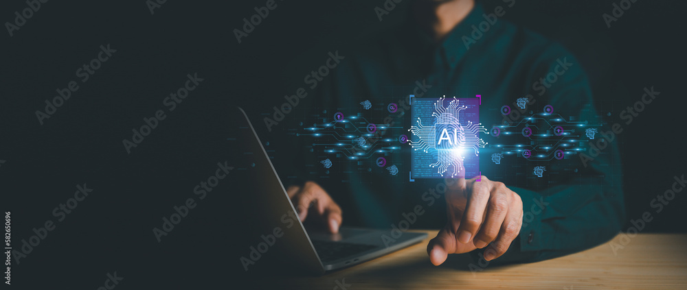 Стоковое фото «Chatbot chat AI concept, artificial intelligence Businessman using AI smart robot ...