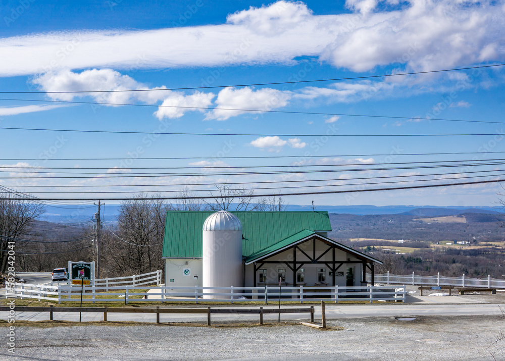 Warwick, NY - USA - March 18, 2023 Horizontal view of the iconic barn ...