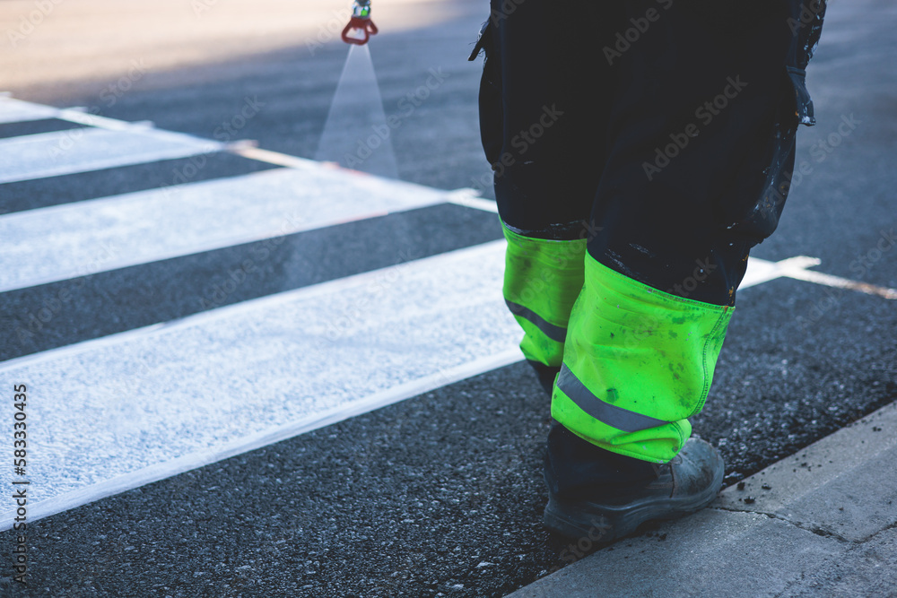 Process of making new road surface markings with a line striping ...