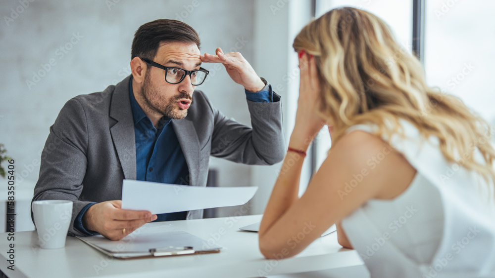 Boss threatening with finger his employee in office. Angry mean boss ...