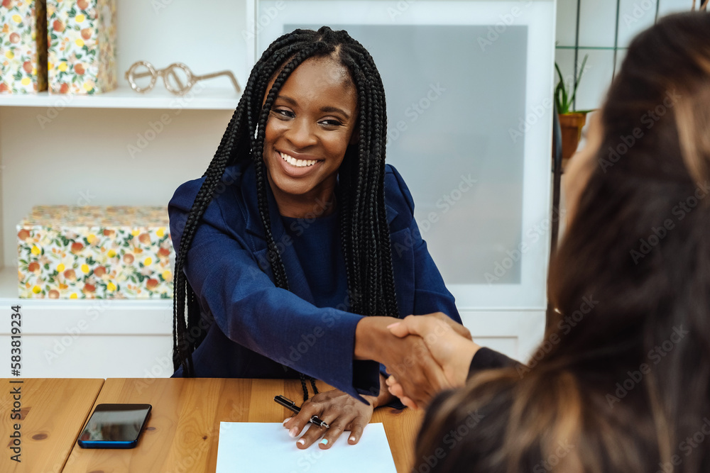 business woman handshake with client Stock Photo | Adobe Stock