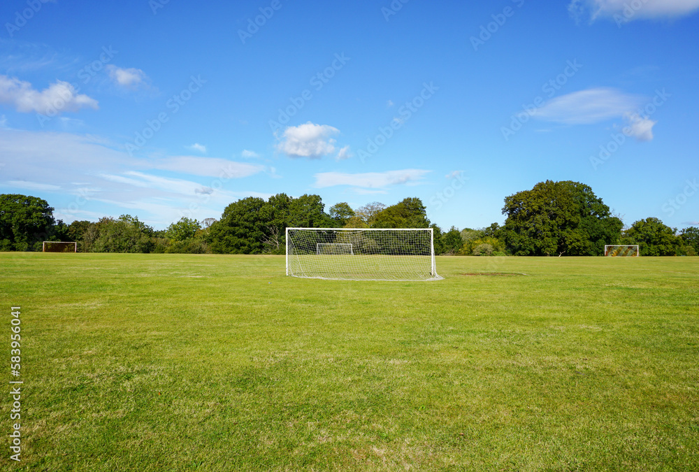 soccer field in public park. goals with nets for football matches or ...