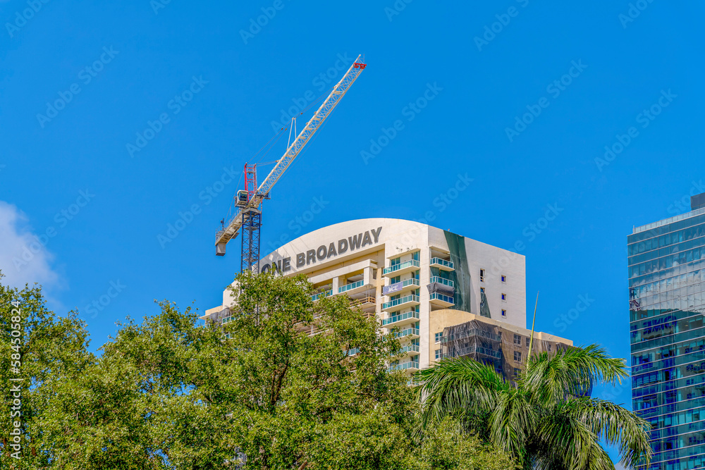 MIAMI, FLORIDA - CIRCA JULY, 2022: Tower crane at the front of One ...