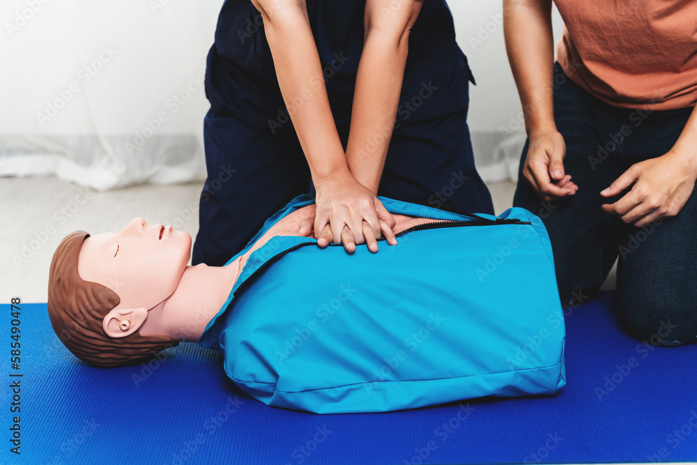 CPR Training ,Emergency and first aid class on cpr doll ...