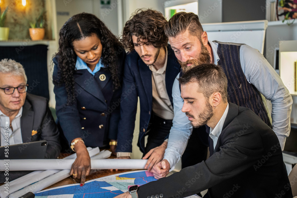 Multicultural business people working together on sustainable ...