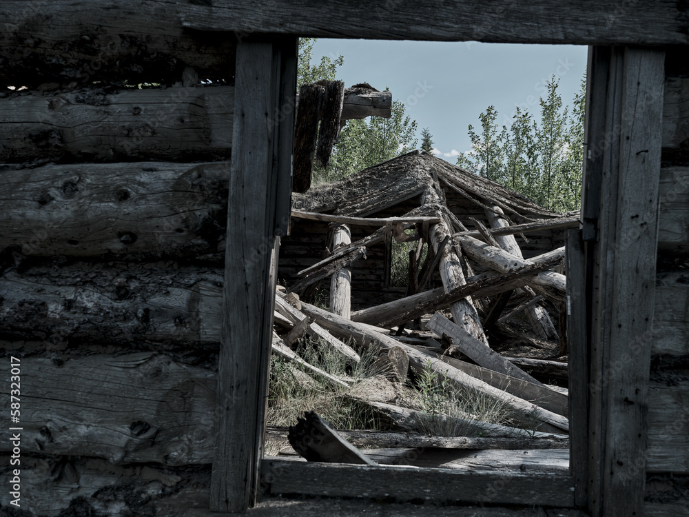 View through the window of a collapsed miners cabin in Silver City on ...