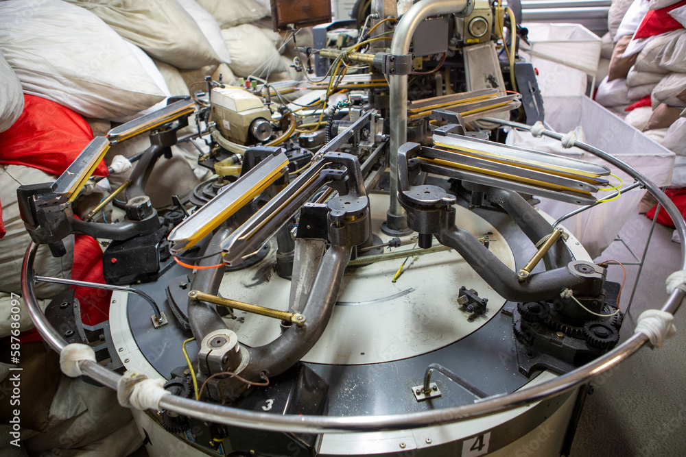 production of capron tights. Textile factory with machines and ...