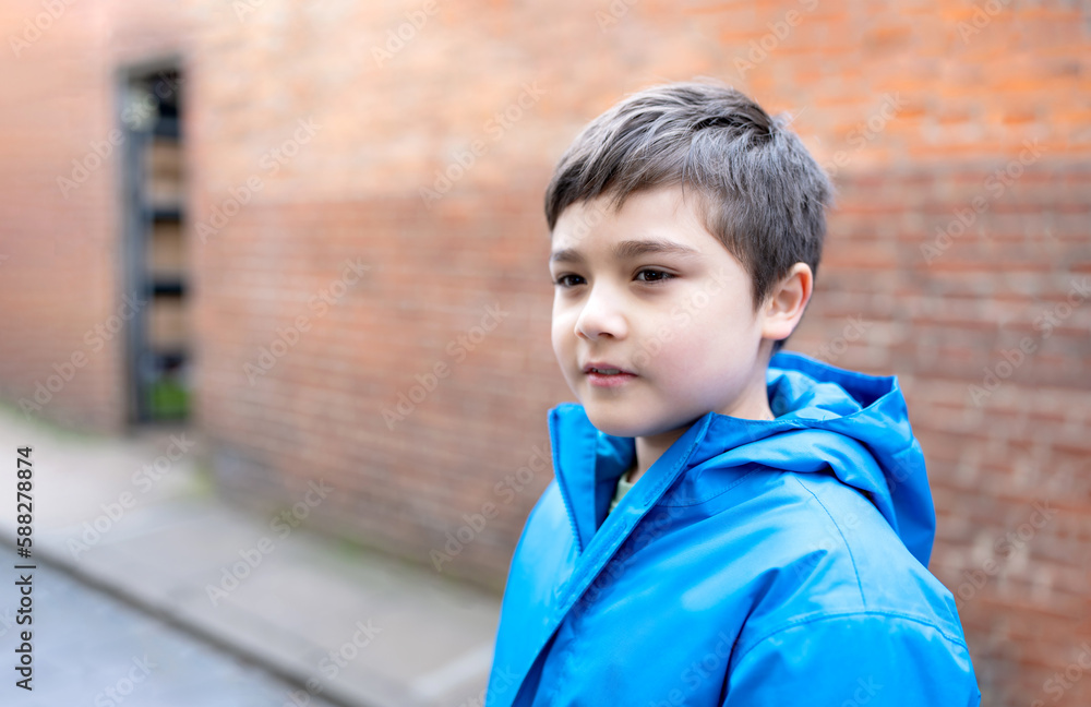 Portrait Boy looking out with smiling face, Side view Portrait Happy ...