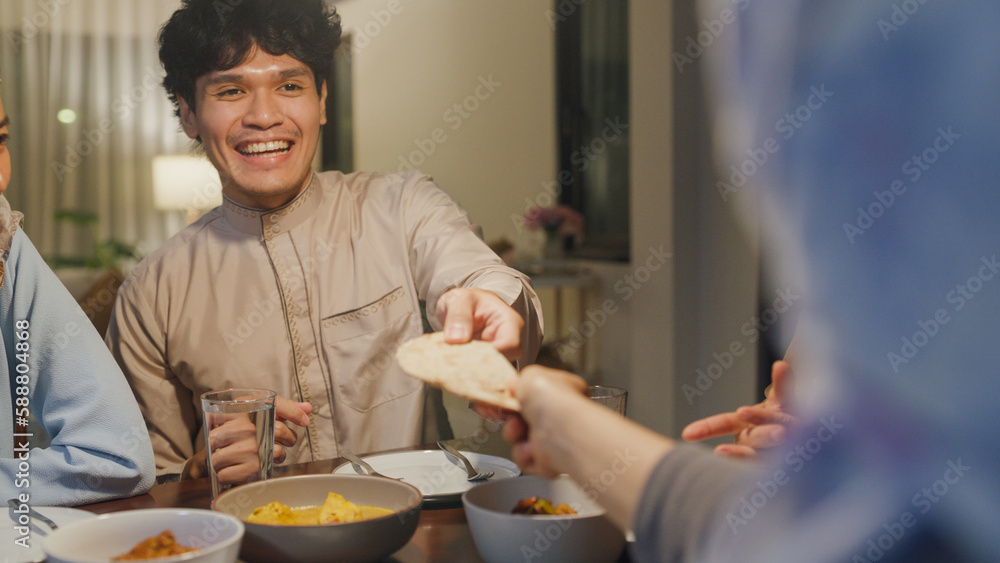 Eid Mubarak Muslim Asia family have Iftar dinner sister share bread to ...