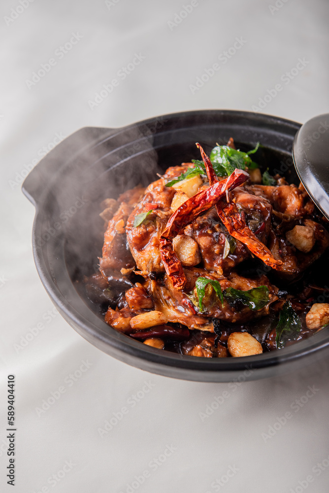 Photo Stock local cook live fresh catfish meat with spicy red dry chili ...