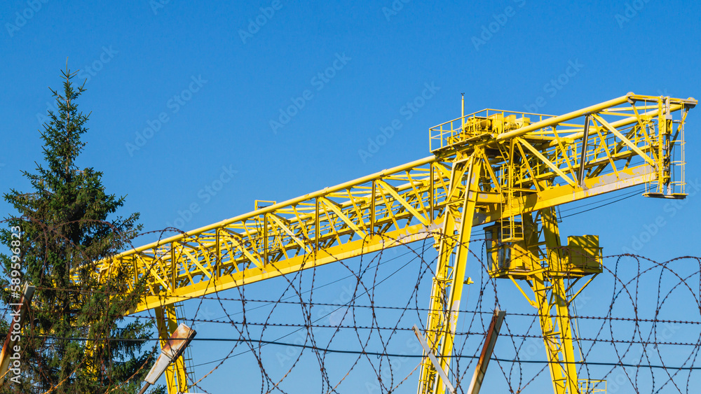 Industrial overhead crane. A crane with a lifting device, a lift that ...