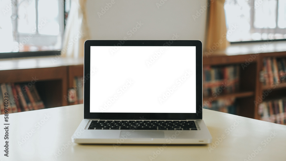 Foto de Stock Blank screen laptop computer set up for work on white ...