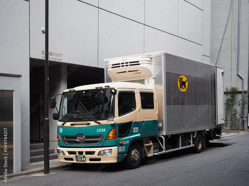 TOKYO, JAPAN - April 6, 2023: A Yamato Transport Company (Kuroneko ...
