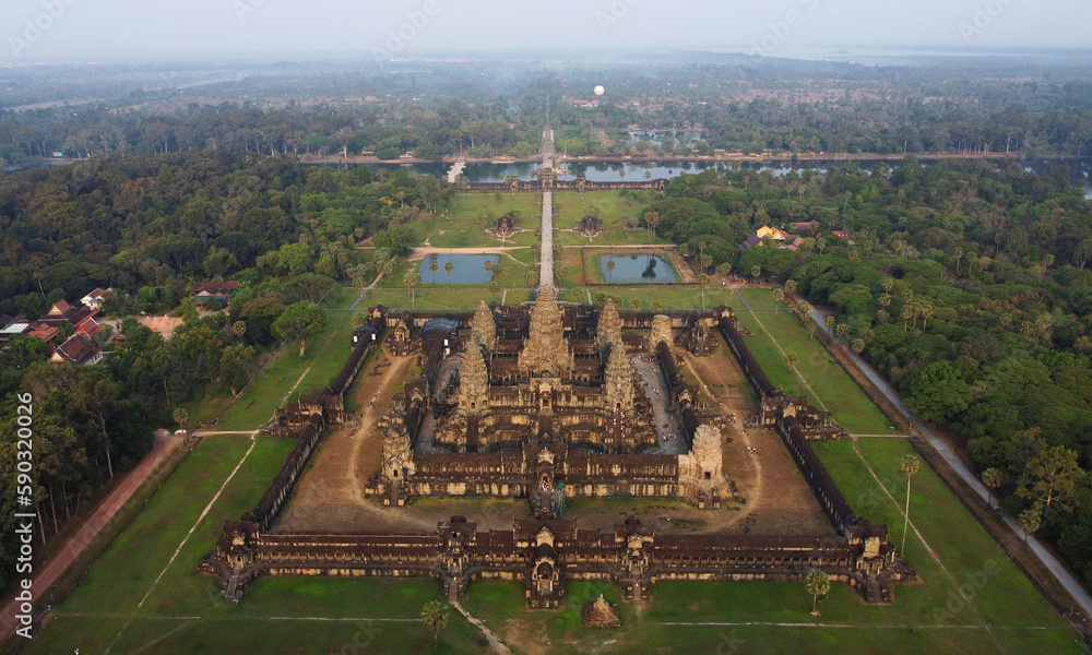 Aerial view of Angkor Wat temple, located in Siem Reap, Cambodia. The Buddhist temple complex is ...
