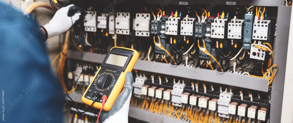 Electricity or electrical maintenance service, Electrician hand holding ...
