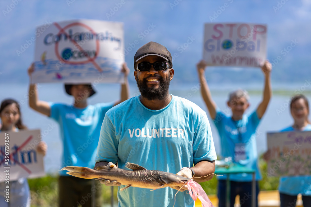 Team of ecologist volunteers are demonstrating rally at ocean for ...
