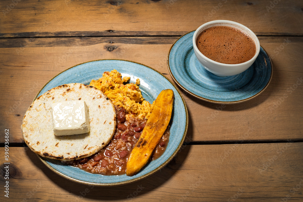Warmed with beans, egg, arepa, cheese, fried plantain and cup of hot ...