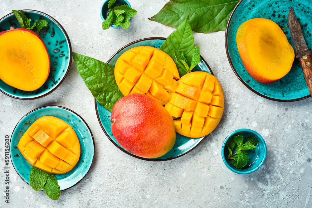 Fresh sliced mangoes. Famous Alphonso mango. Top view on a rustic ...