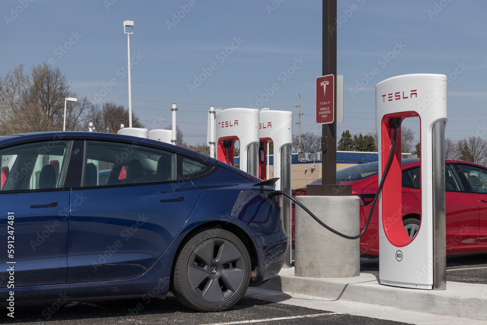 Tesla EV electric vehicle charging. Tesla products include electric ...