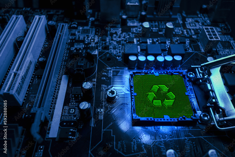Computer motherboard and CPU with recycling symbol. Digital ...