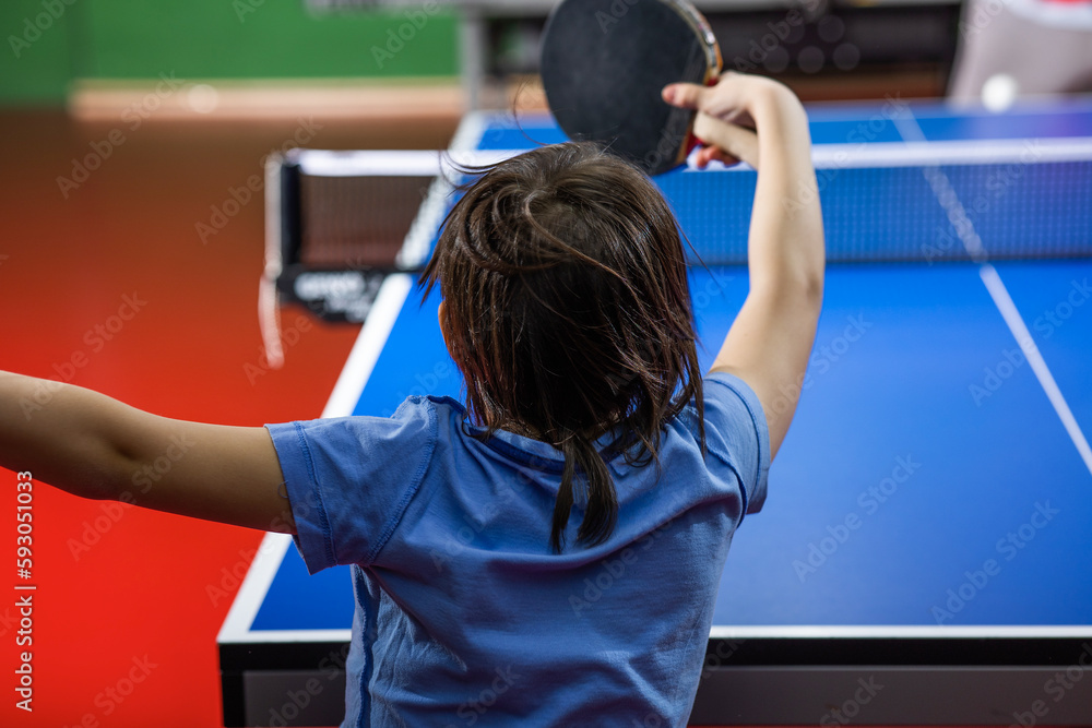 Little girl playing table tennis Stock Photo | Adobe Stock