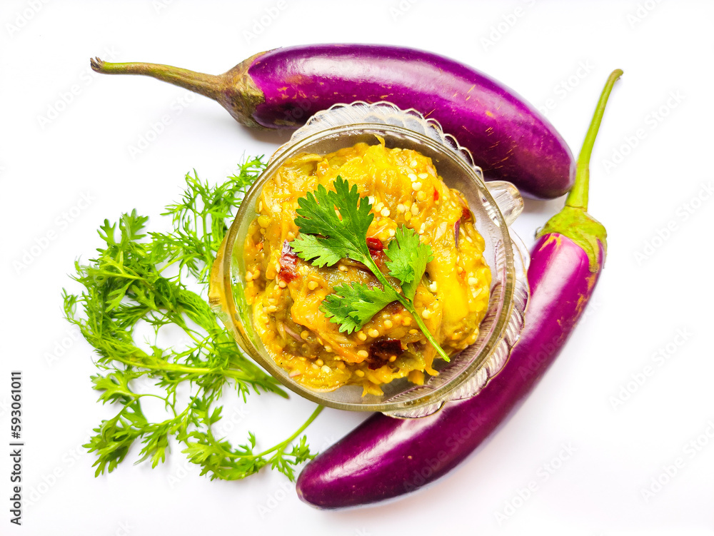 Roasted mashed eggplant or Begun bhorta.Roasted mashed eggplant is also ...