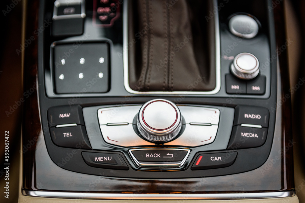 Foto Console with buttons on car panel. On-board computer control unit ...