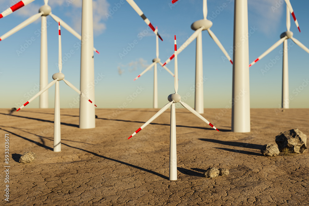 large wind farm with multiple windmills in desert environment ...