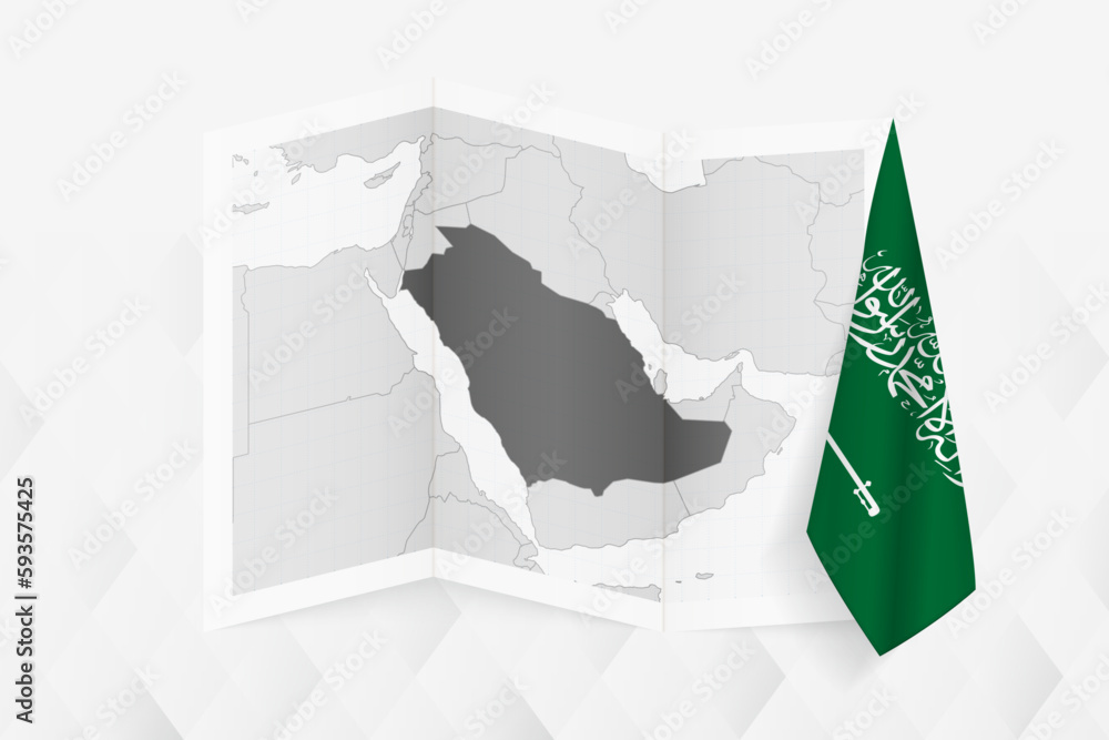 A grayscale map of Saudi Arabia with a hanging Saudi Arabian flag on ...