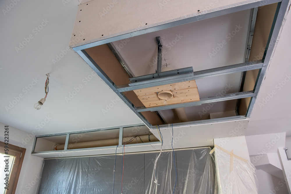 Finishing works in a new house. Suspended Ceilings. Drywall ceiling ...