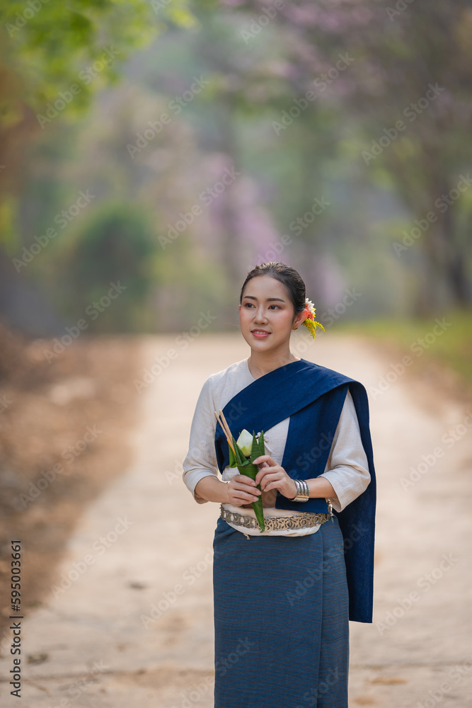 Beautiful Asian girl of rural villagers wearing the traditional ...