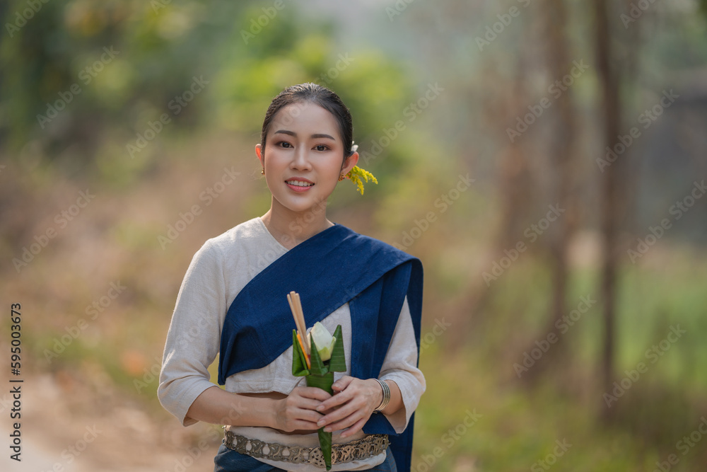 Beautiful Asian girl of rural villagers wearing the traditional ...
