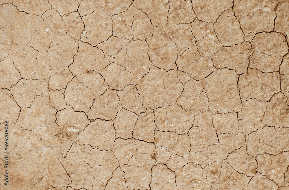 Cracked ground background in the top view for graphic design or ...