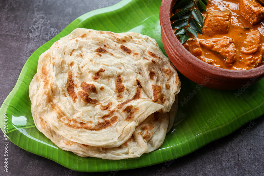 Photo Stock Fish curry with Kerala parathas porotta roti parotta ...