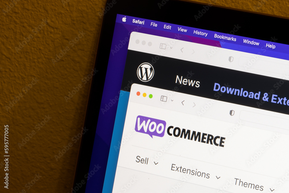Portland, OR, USA - Feb 3, 2023: Website homepages of WooCommerce and WordPress are seen on a ...