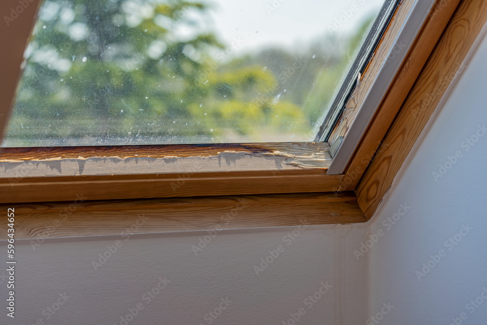 Roof window after leaking, wood is starting to rot, old weathered ...