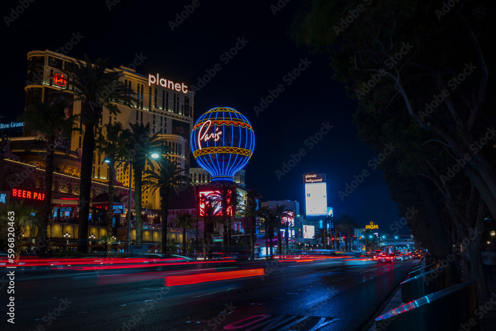 Night view of Las Vegas cityscape with gorgeous defocused light tracers ...