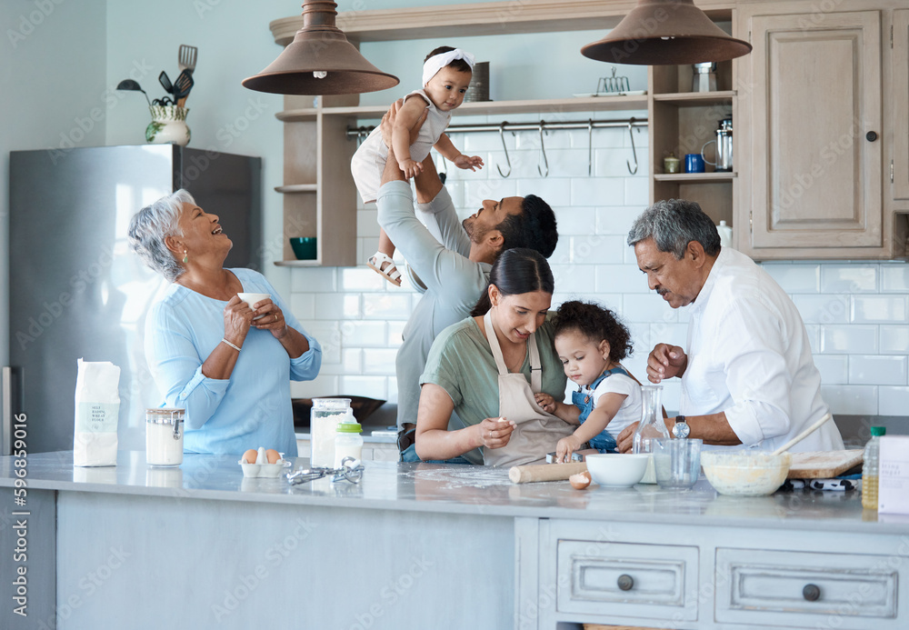The kitchen is our happy place. Shot of a multigenerational family ...