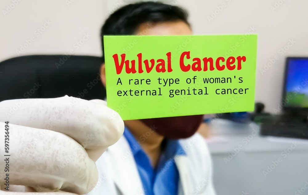 Vulvar Cancers word in a card on doctor hand, health concept. Medical ...