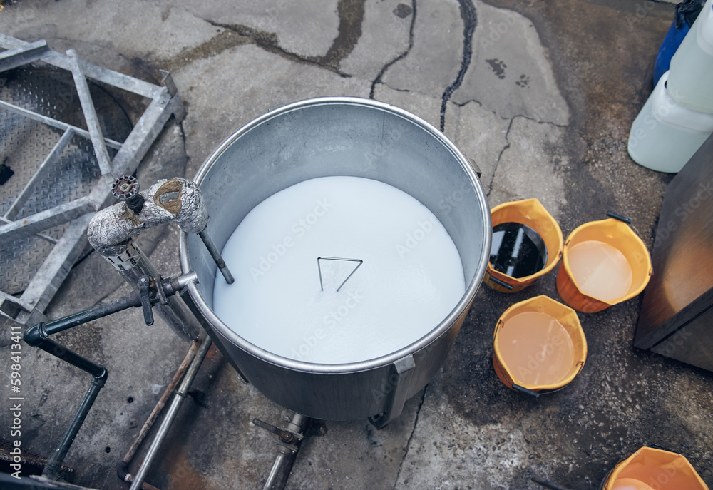 Bleach and dye acidic chemical compounds in an industrial metal ...