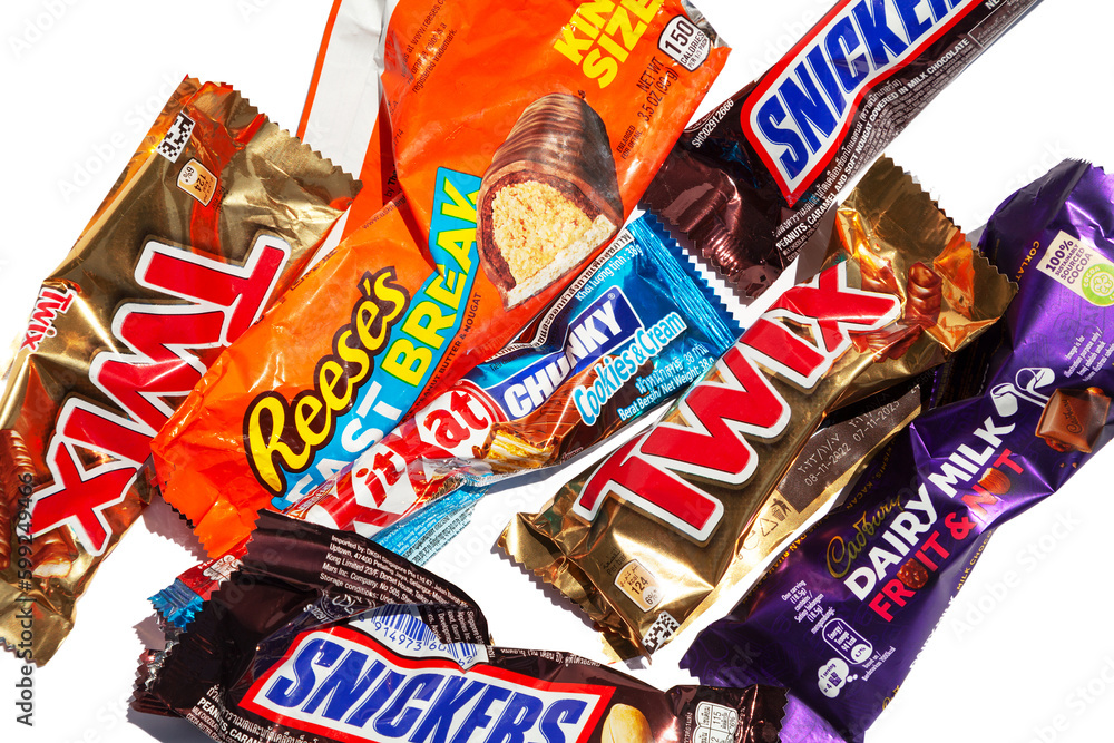 Empty wrappers with logos of popular chocolate bar candies, Twix ...