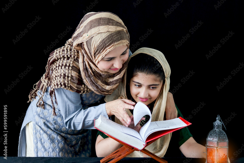Adorable Pakistani girl with beautiful eyes wear hijab, learning Quran ...