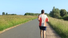 Runner On The Dike Free Stock Photo - Public Domain Pictures
