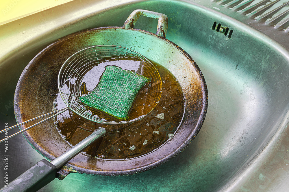 Wash the used pan and pour the old oil into the sink. Causing sinks and ...