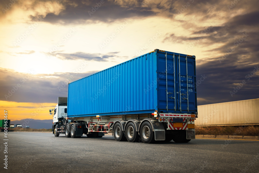 Semi Trailer Truck Driving on Highway Road. Shipping Container Trucks ...