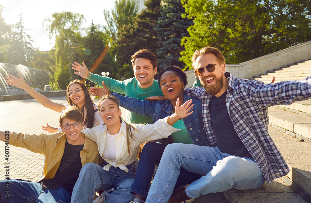 Bunch of happy multiracial friends having fun outdoors. Diverse group ...